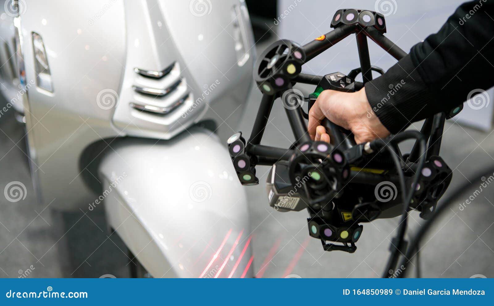 Man Scanning a Motorcycle Using a Measuring Machine 3D Scan High ...