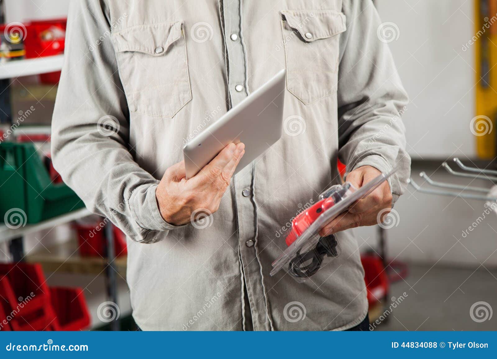 Man Scanning Product through Digital Tablet Stock Photo - Image of ...