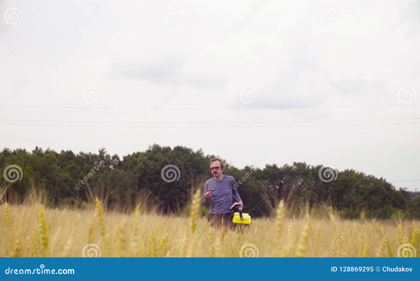 The Man Scientist Ecologist Walking through the Wheat Field Stock Image ... The Man Scientist Ecologist Walking through the Wheat Field Stock Image ...
