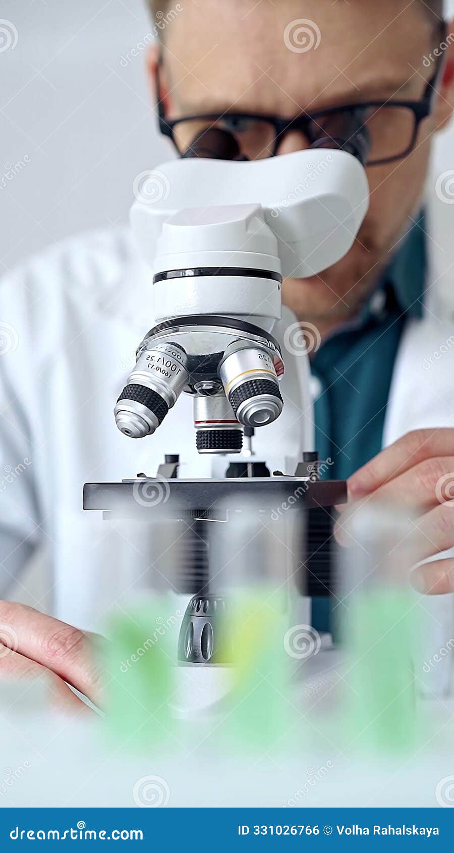 Man Scientist Using Microscope in Laboratory. Microbiology Science ...