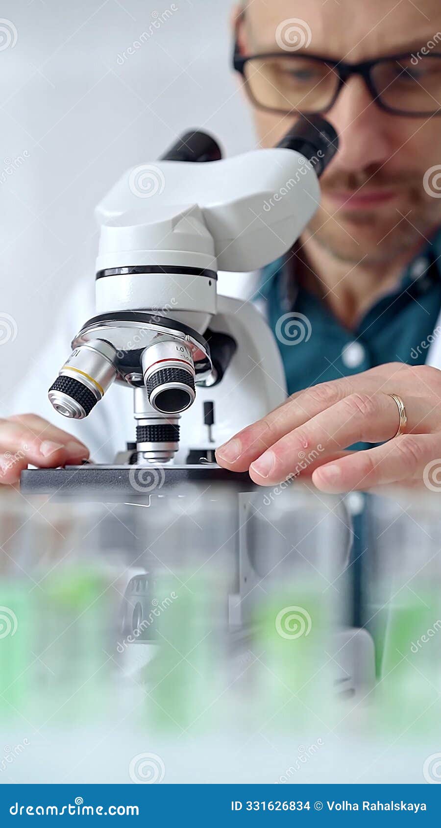 Man Scientist Using Microscope in Laboratory. Microbiology Science ...