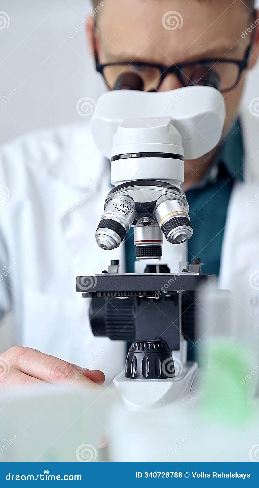 Man Scientist Using Microscope in Laboratory. Microbiology Science ...