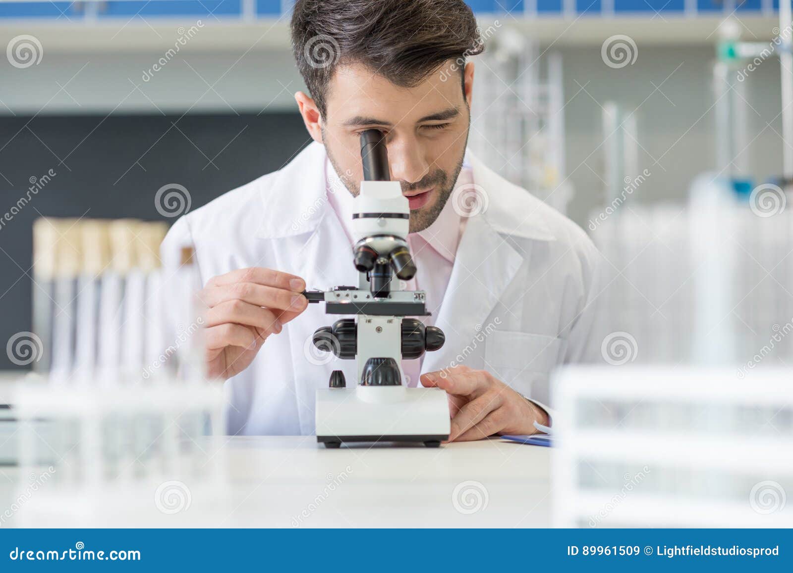 Man Scientist in White Coat Working with Microscope Stock Image - Image ...