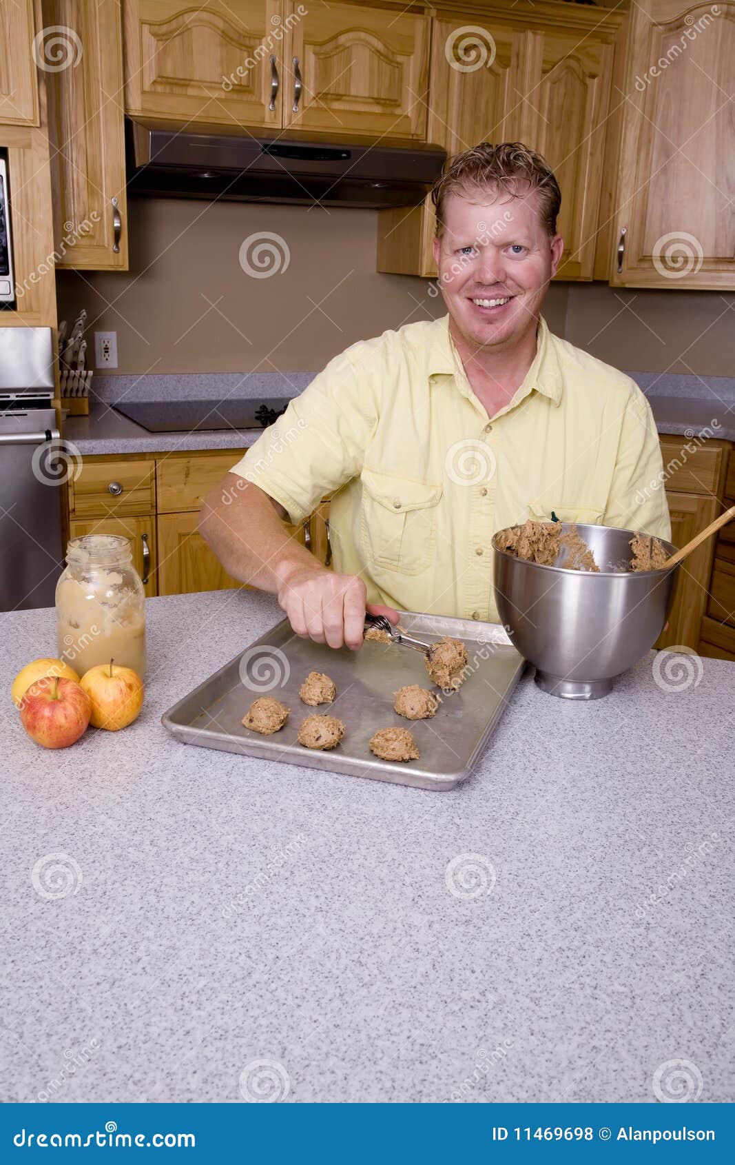 Man scooping cookies stock photo. Image of cook, preparing - 11469698