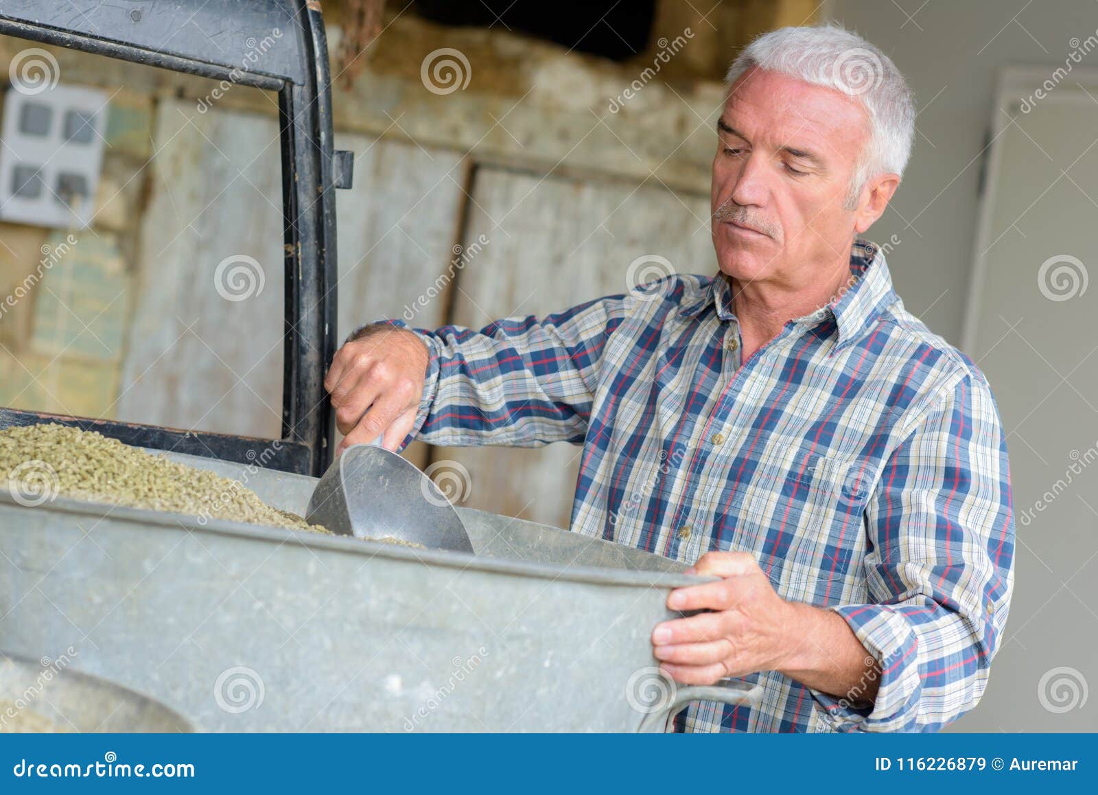 Man scooping dry goods stock image. Image of scooping - 116226879