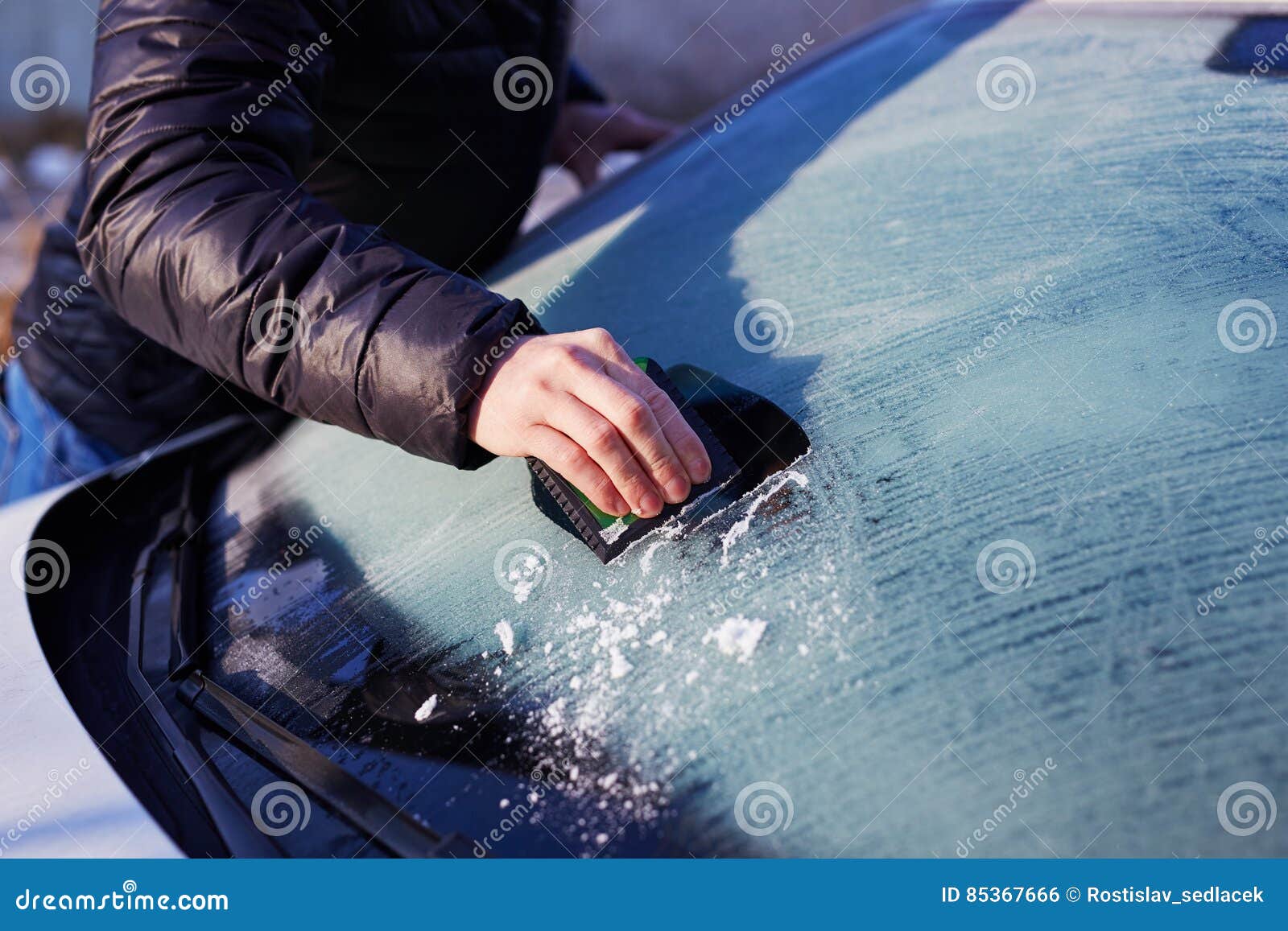 Man Scraping Ice from the Windshield Stock Photo - Image of hand ...