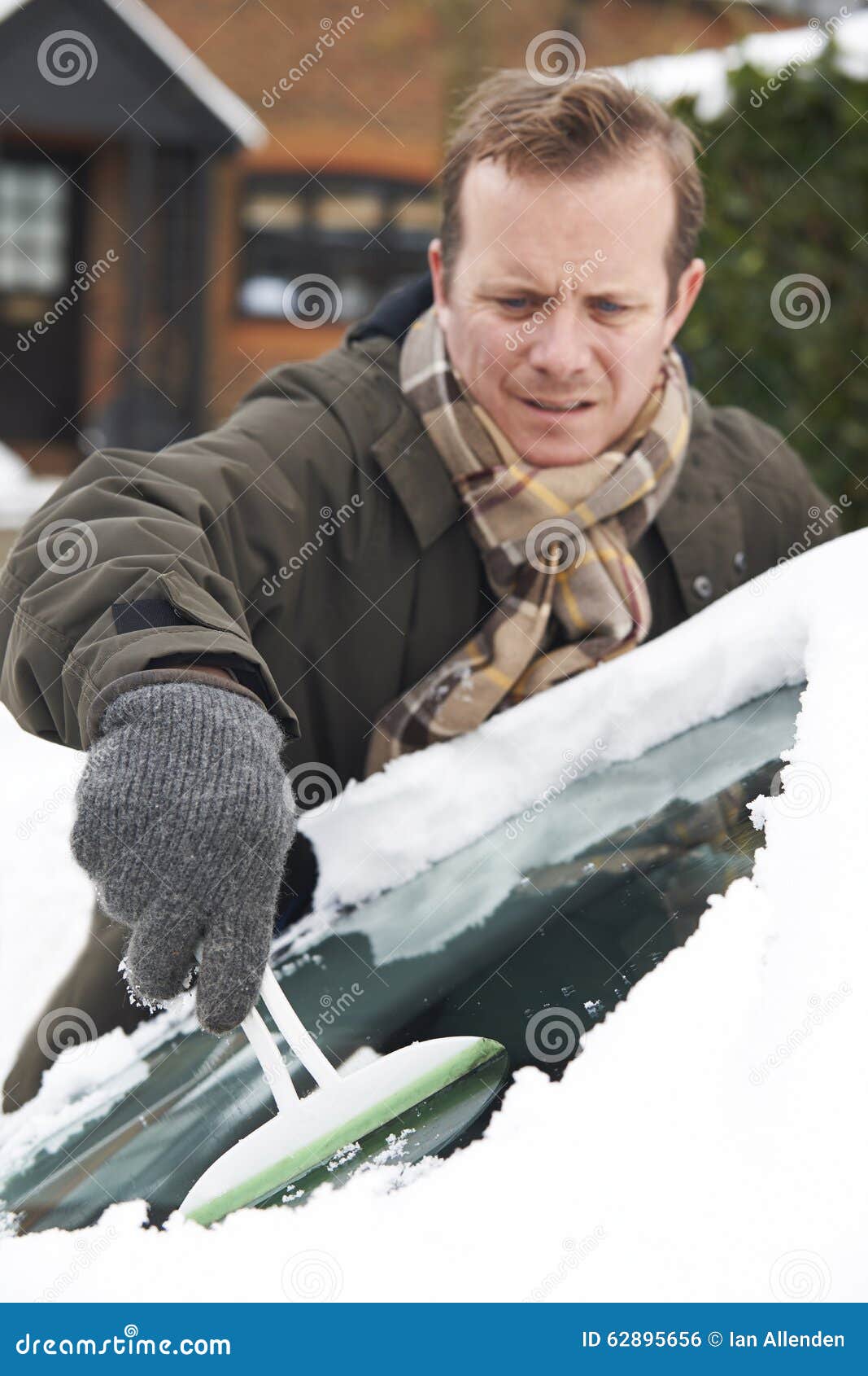 Man Scraping Snow from Car Windscreen Stock Photo - Image of outdoors ...