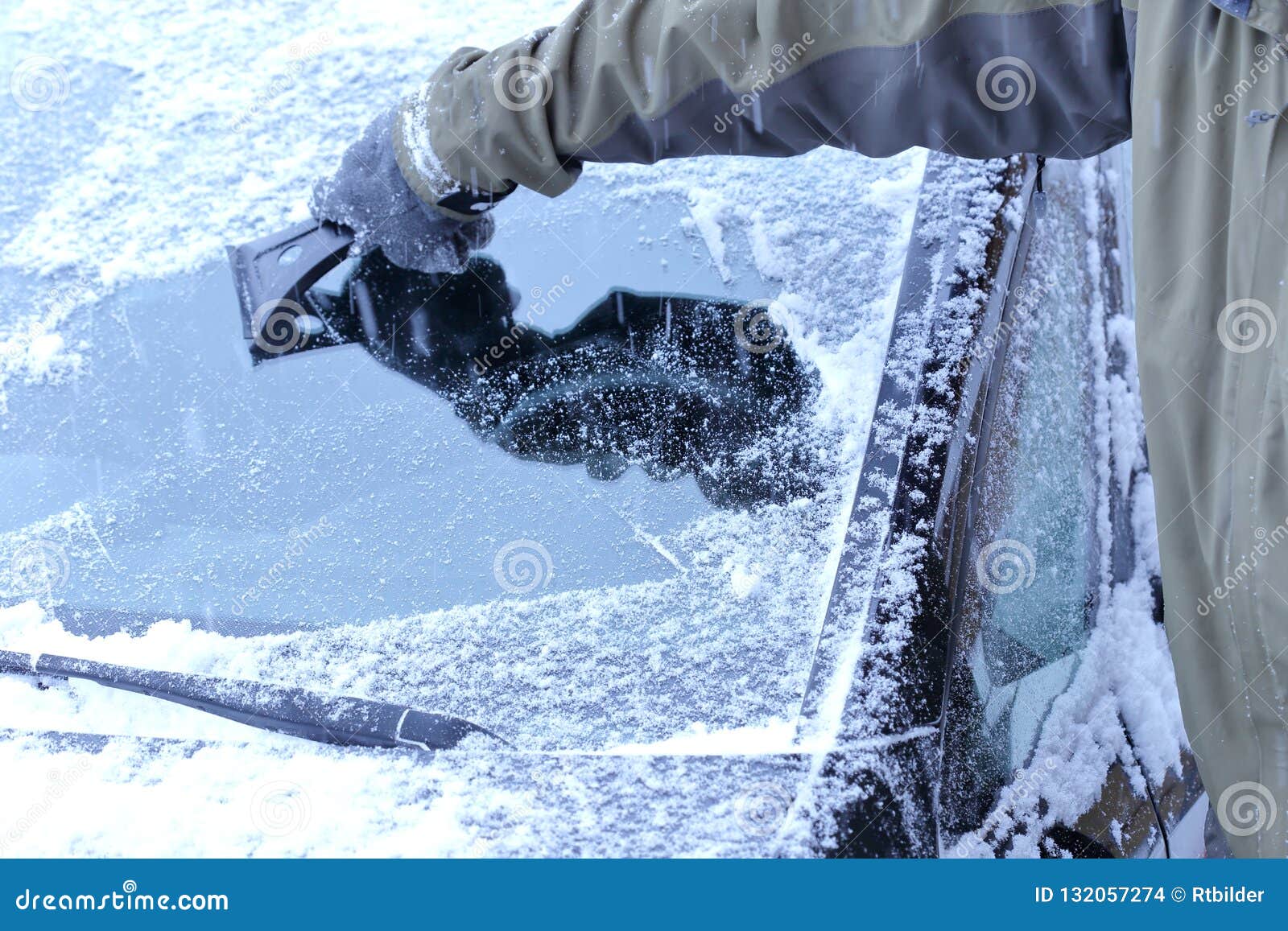 A Man is Scraping the Windshield Stock Photo - Image of season ...