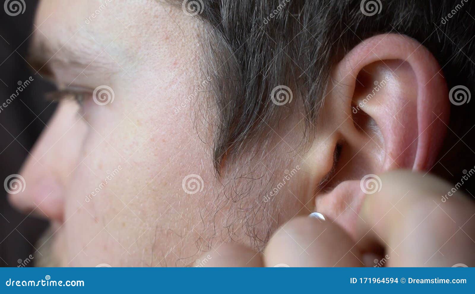 A Man Scratches His Ear and Thinks Stock Footage - Video of earlobe ...
