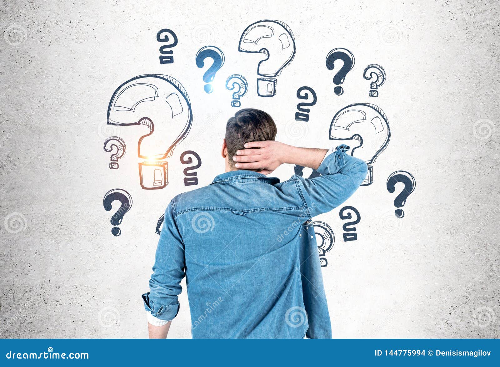 Man Scratching Head Looking at Question Marks Stock Photo - Image of ...