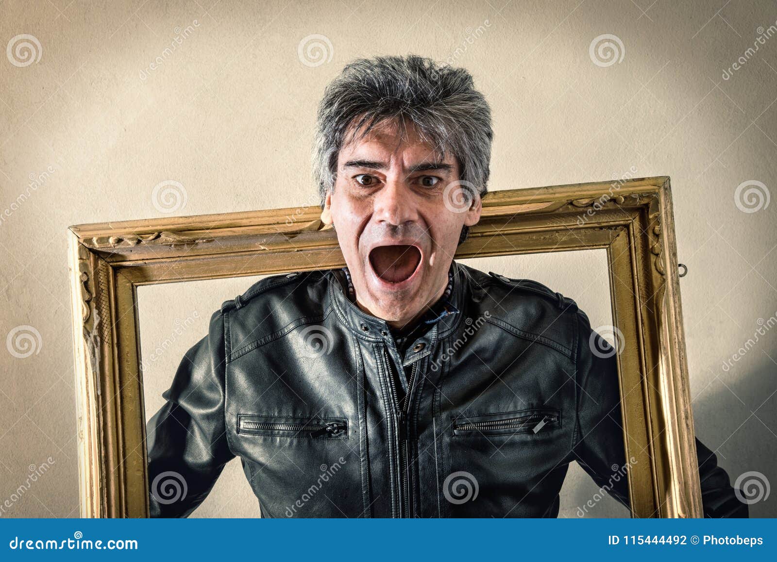Man Screaming with a Frame at the Neck Stock Photo - Image of caucasian ...