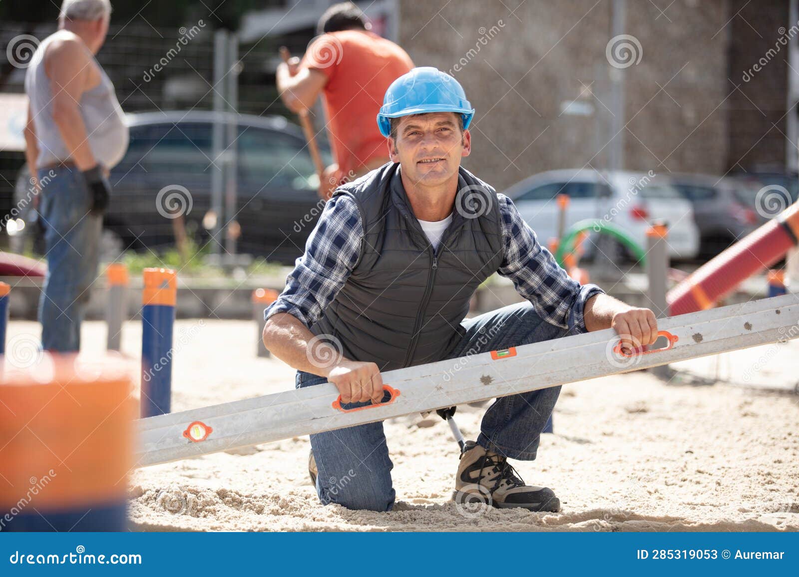 Man Screeding Sand for Concrete Foundations Stock Image - Image of ...