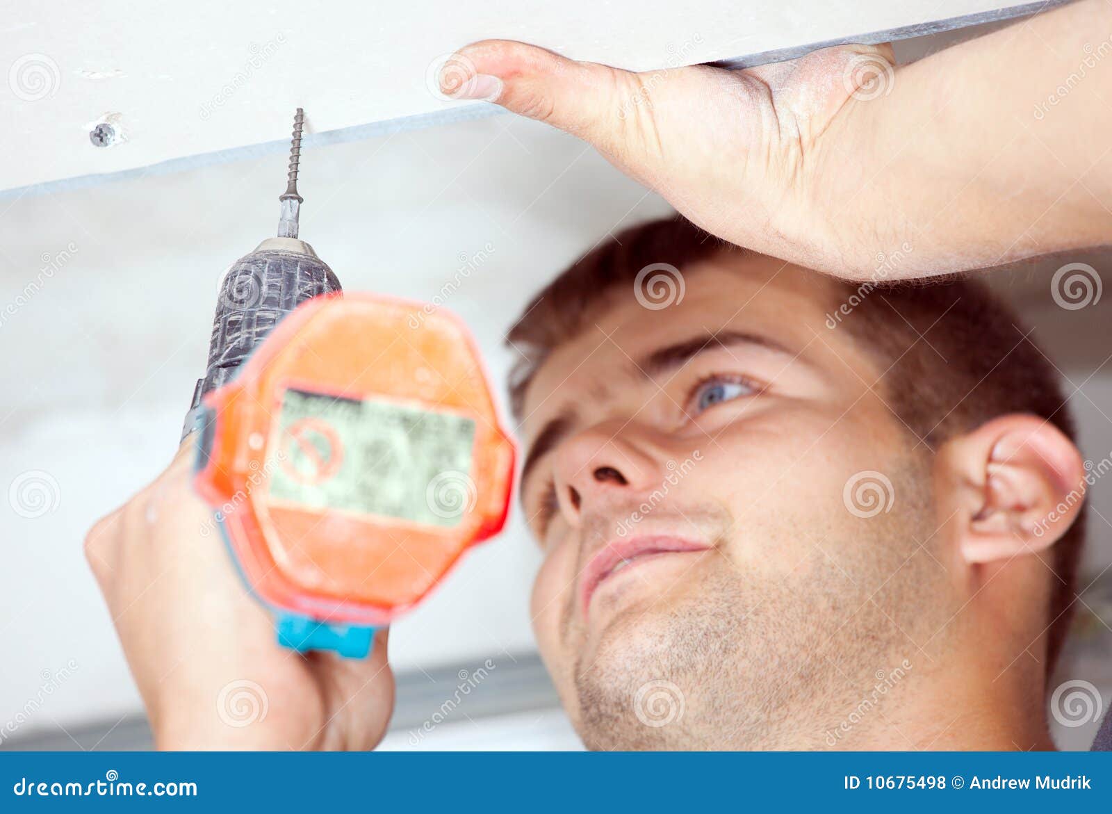 Man with screwdriver stock photo. Image of construction - 10675498