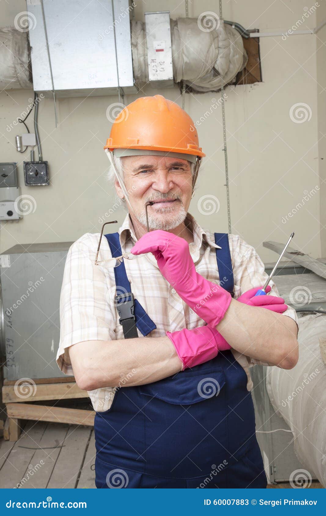 Man with Screwdriver in Helmet Stock Image - Image of laborer, builder ...