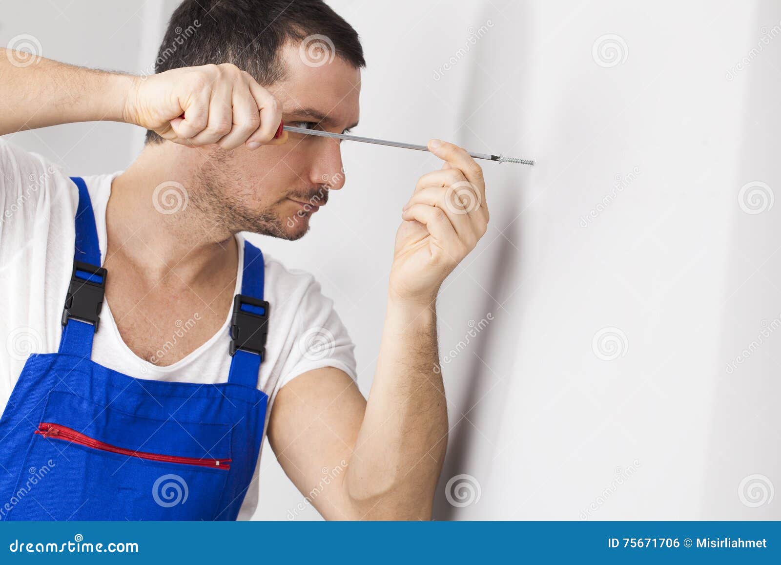 Man with Screwdriver stock photo. Image of worker, improvement - 75671706