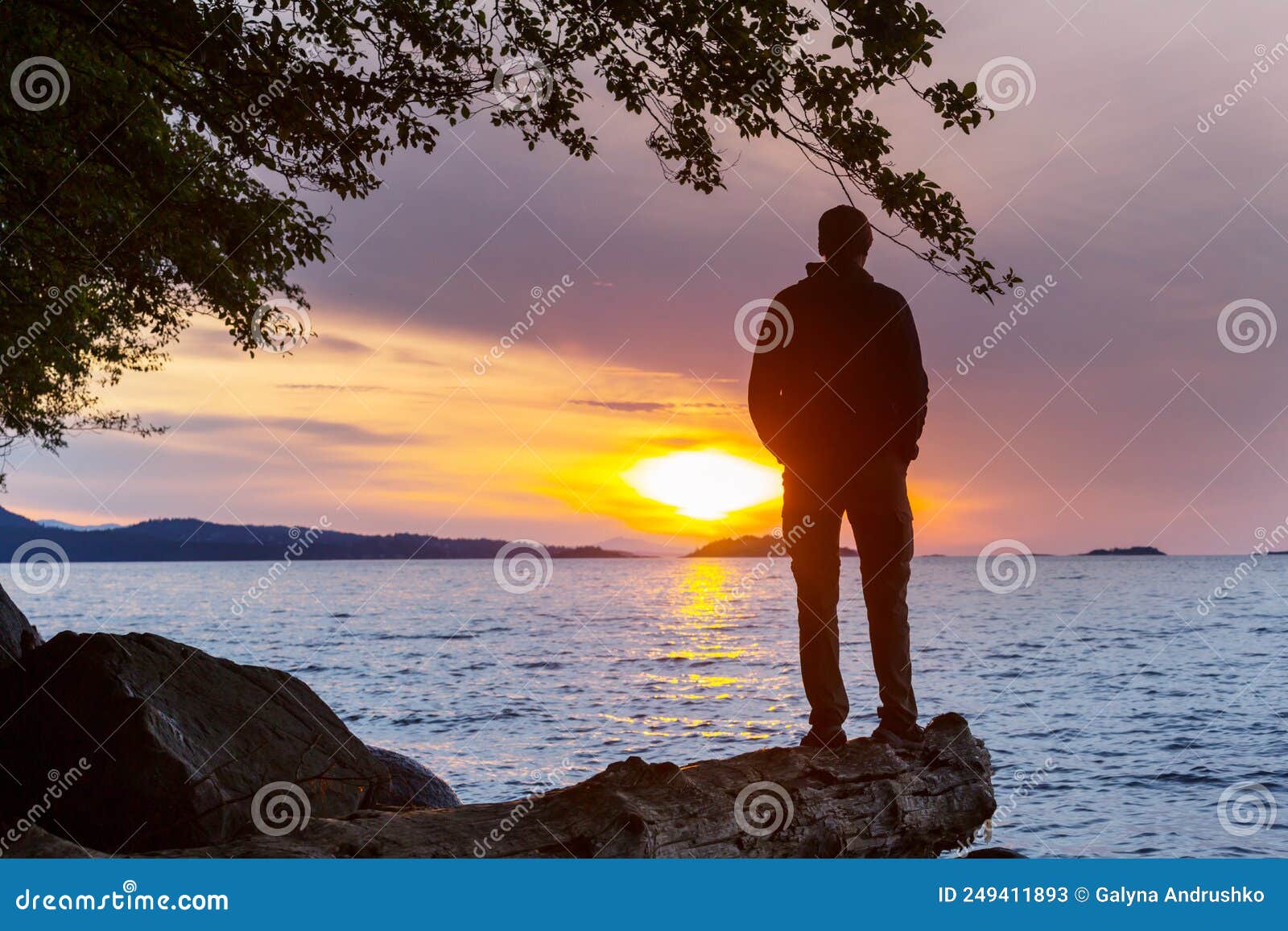 Man on sea sunset stock image. Image of serenity, travel - 249411893