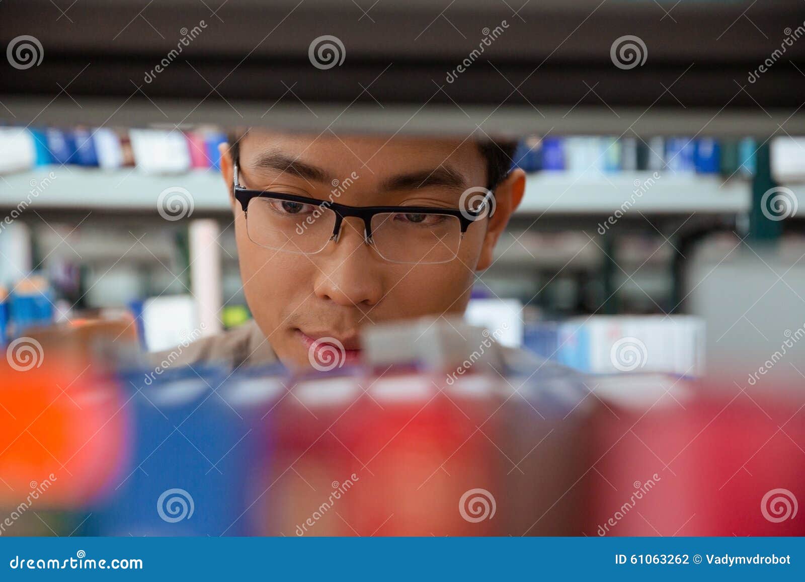 Man Searching Book in Library Stock Photo - Image of bookstore ...
