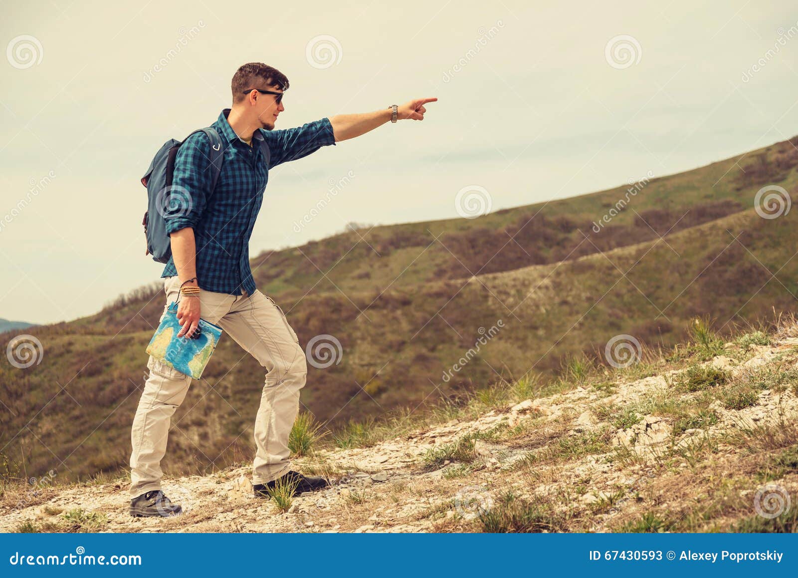 Man Searching Direction in the Mountains Stock Image - Image of tourist ...