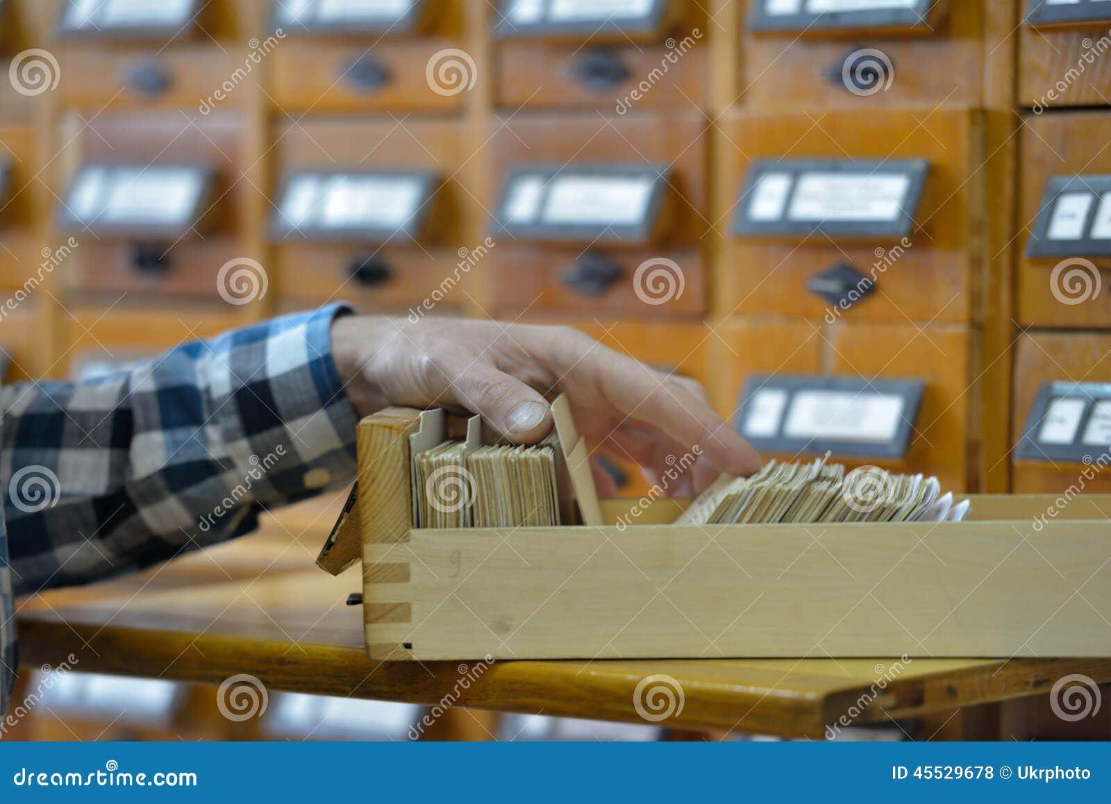 Man Searching in a Library Catalog Stock Photo - Image of cards ...