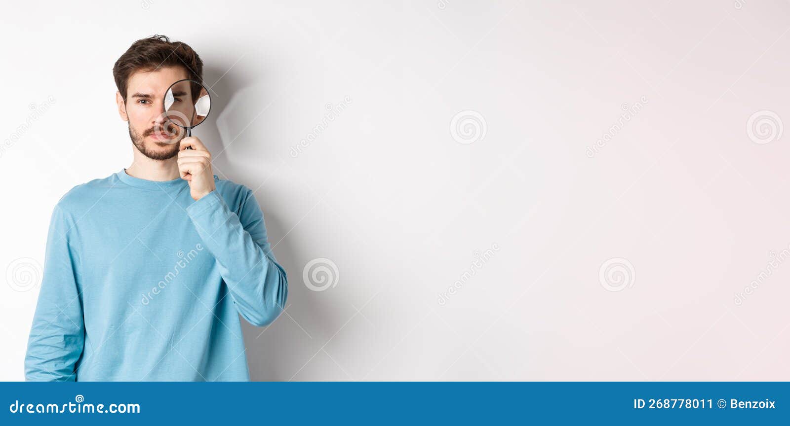 Man Searching for Something, Looking through Magnifying Glass at Camera ...