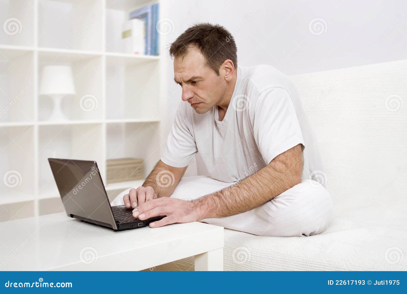 Man seating with laptop stock image. Image of human, looking - 22617193