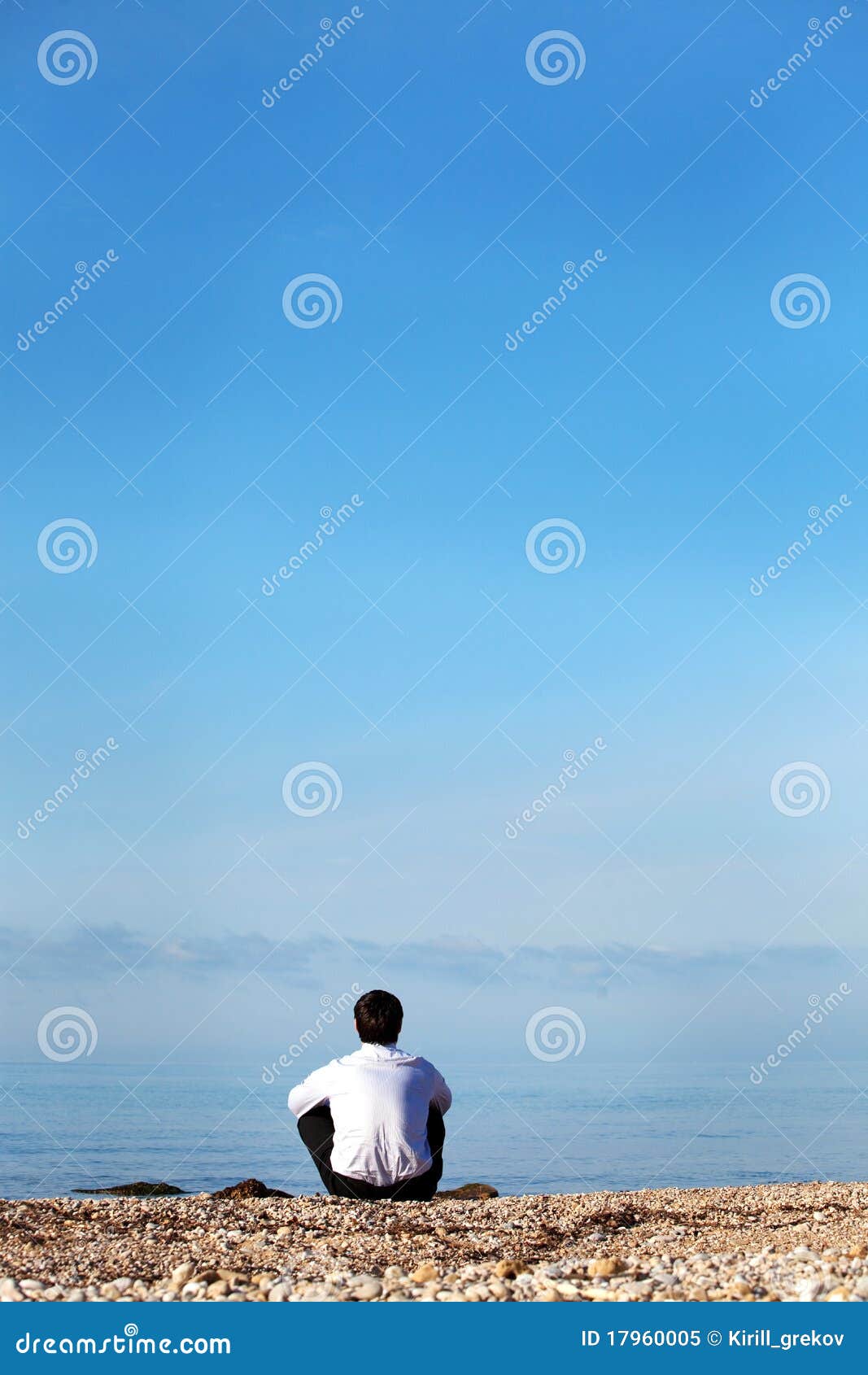 Man Seating on the Sea Shore Stock Image - Image of shore, seating ...