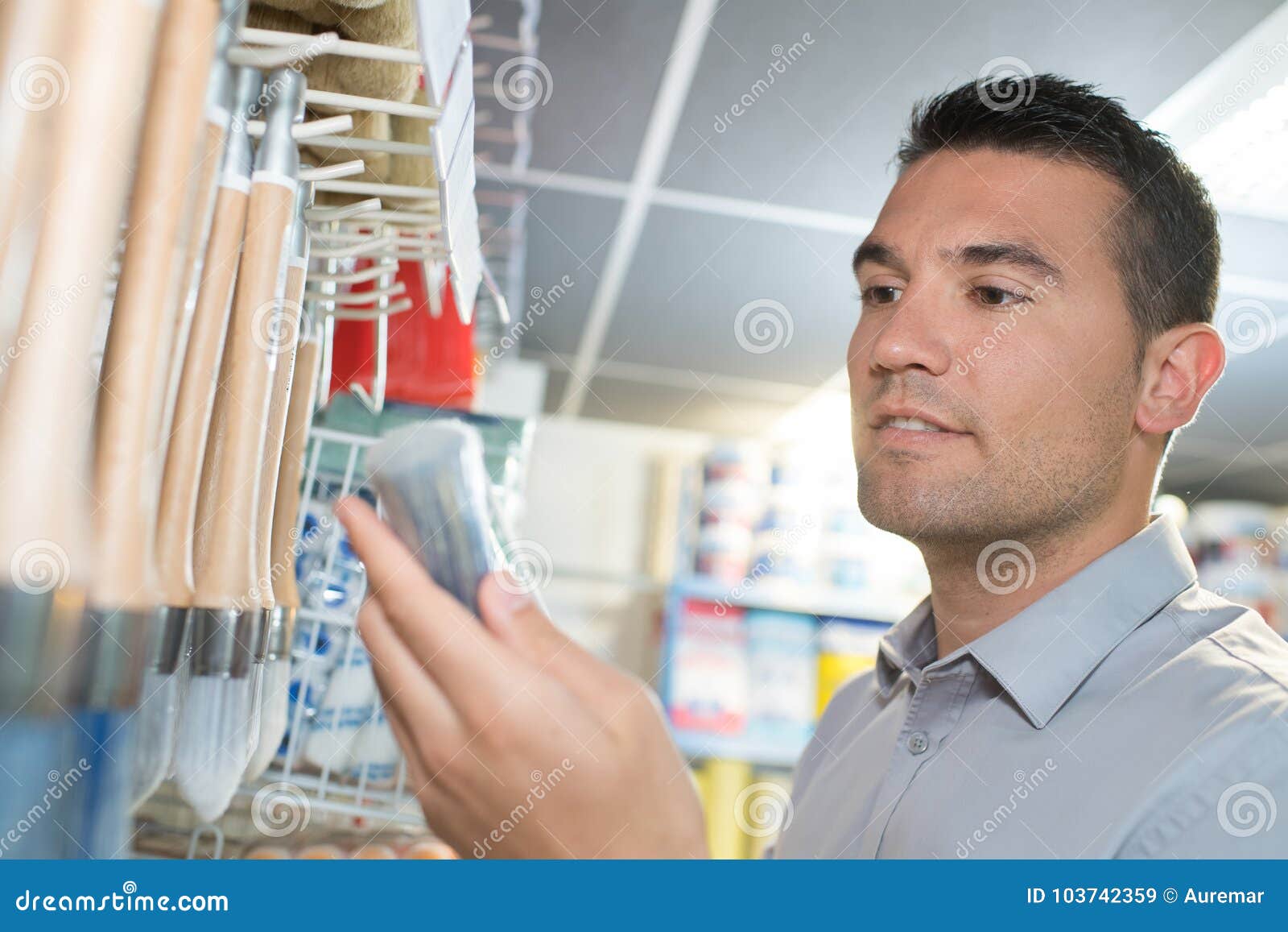 Man Selecting Brush in Hardware Stock Image - Image of company, size ...