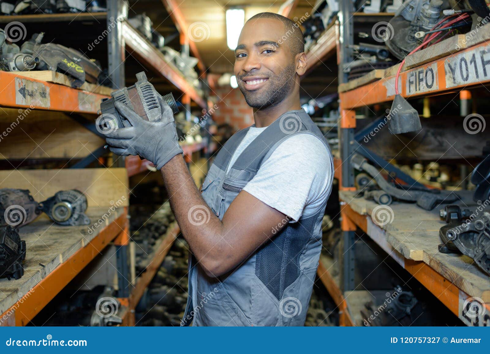 Man Selecting Car Part from Racking Stock Image - Image of looking ...