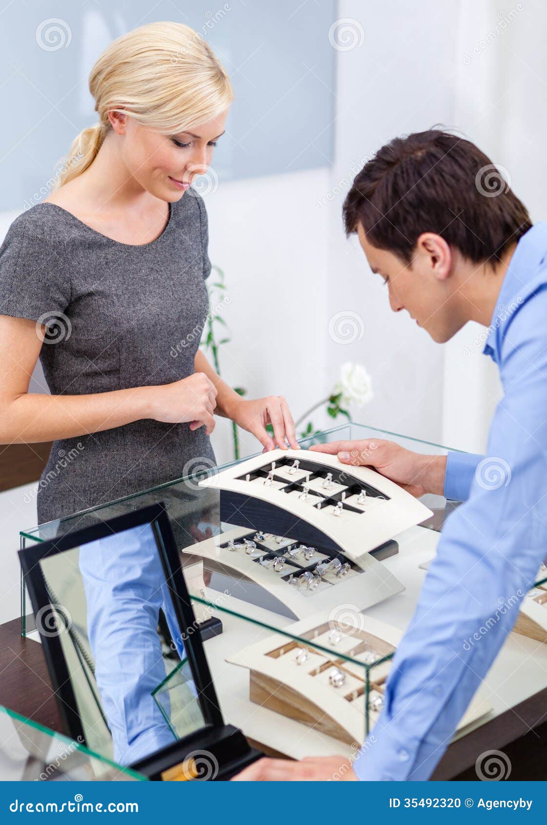 Man Selecting Engagement Ring Stock Photo - Image of buyer, buying ...