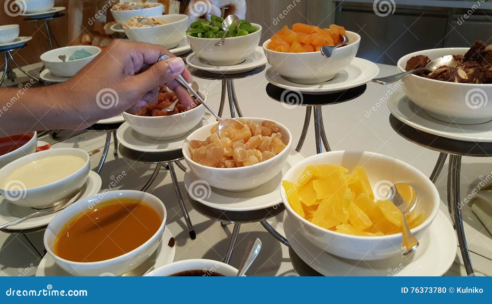 A Man Selects Variety of Sweet Choices Stock Photo - Image of food ...