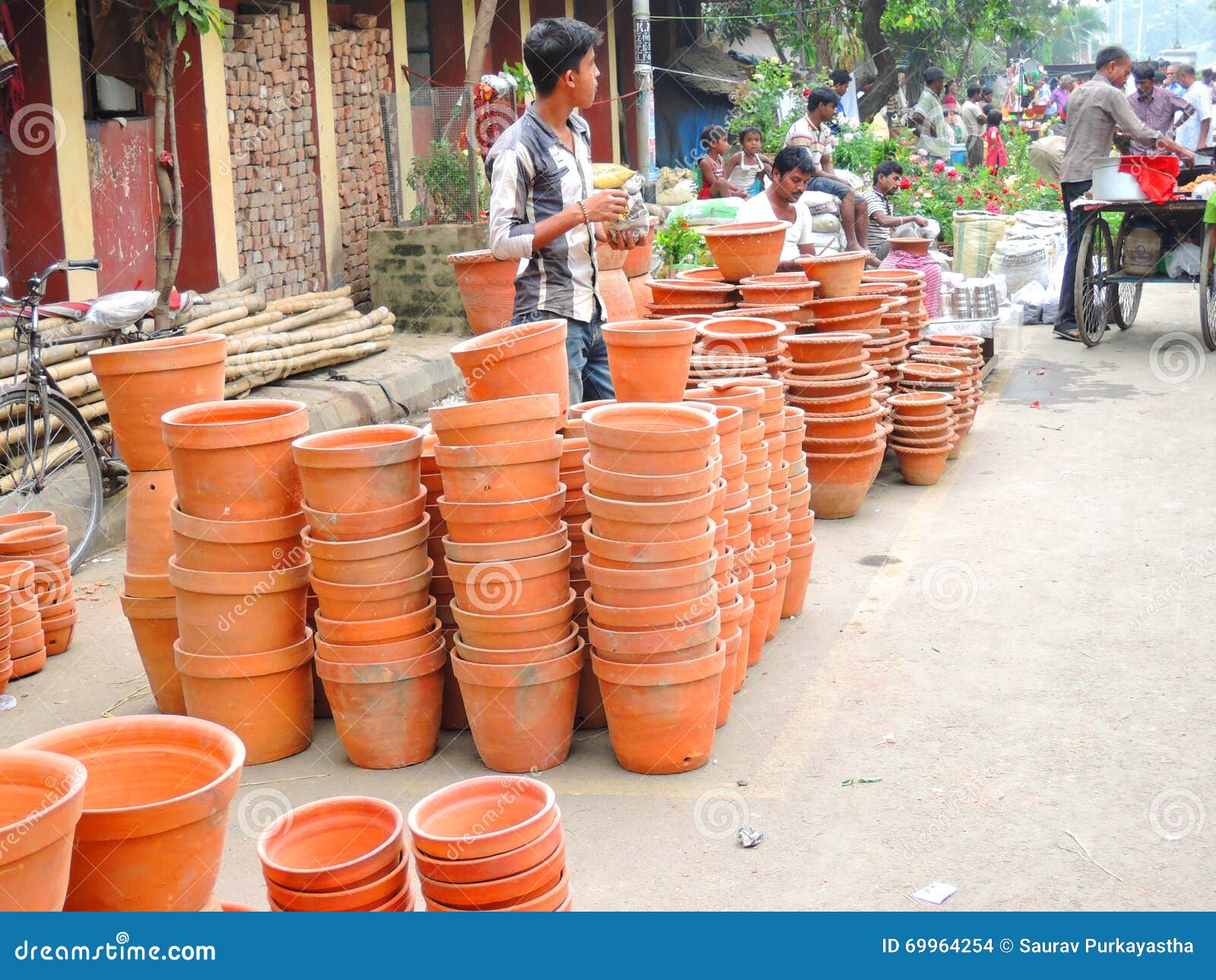 A man selling earthen pots editorial stock image. Image of concept ...