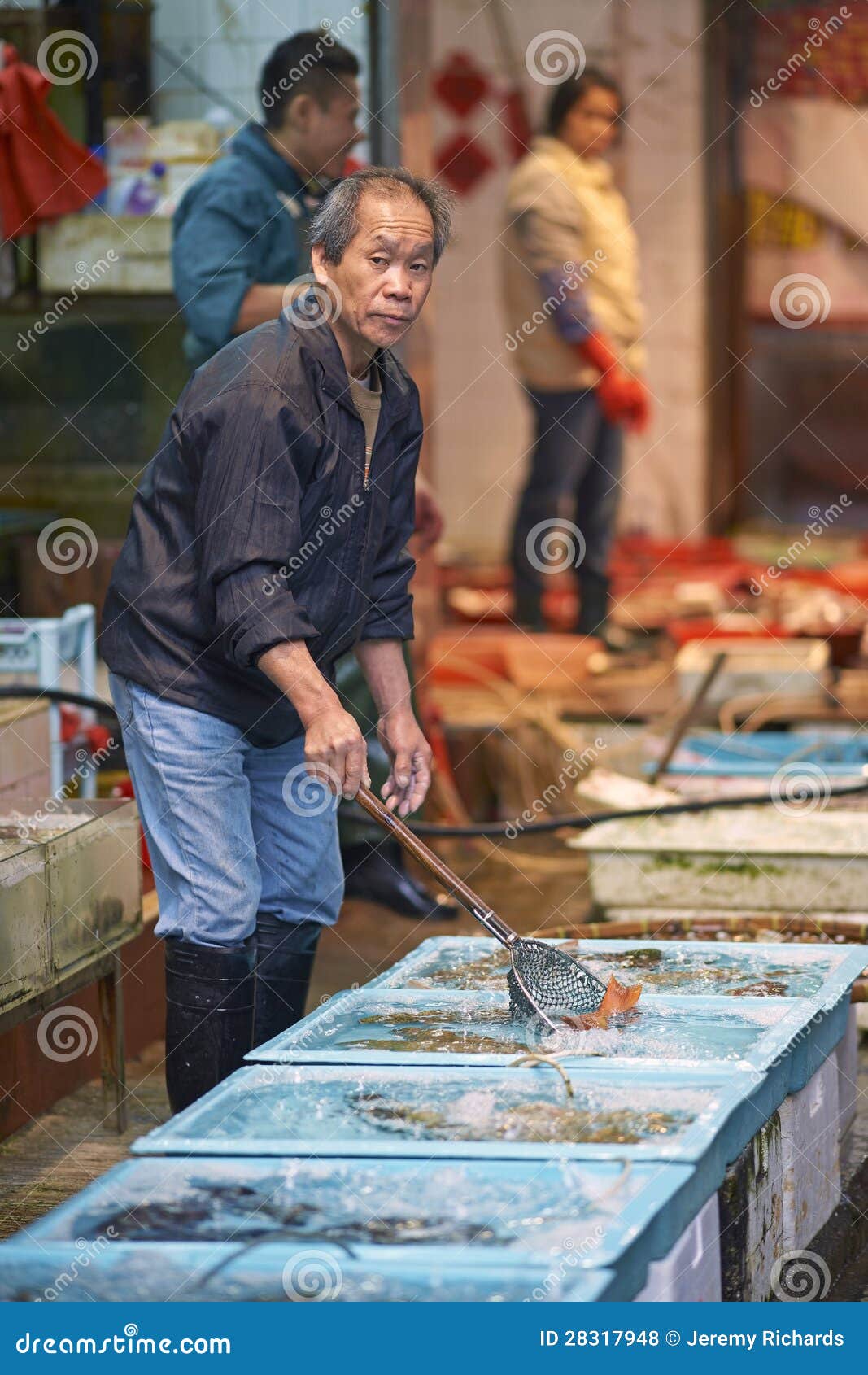 Man selling fish editorial stock photo. Image of woman - 28317948