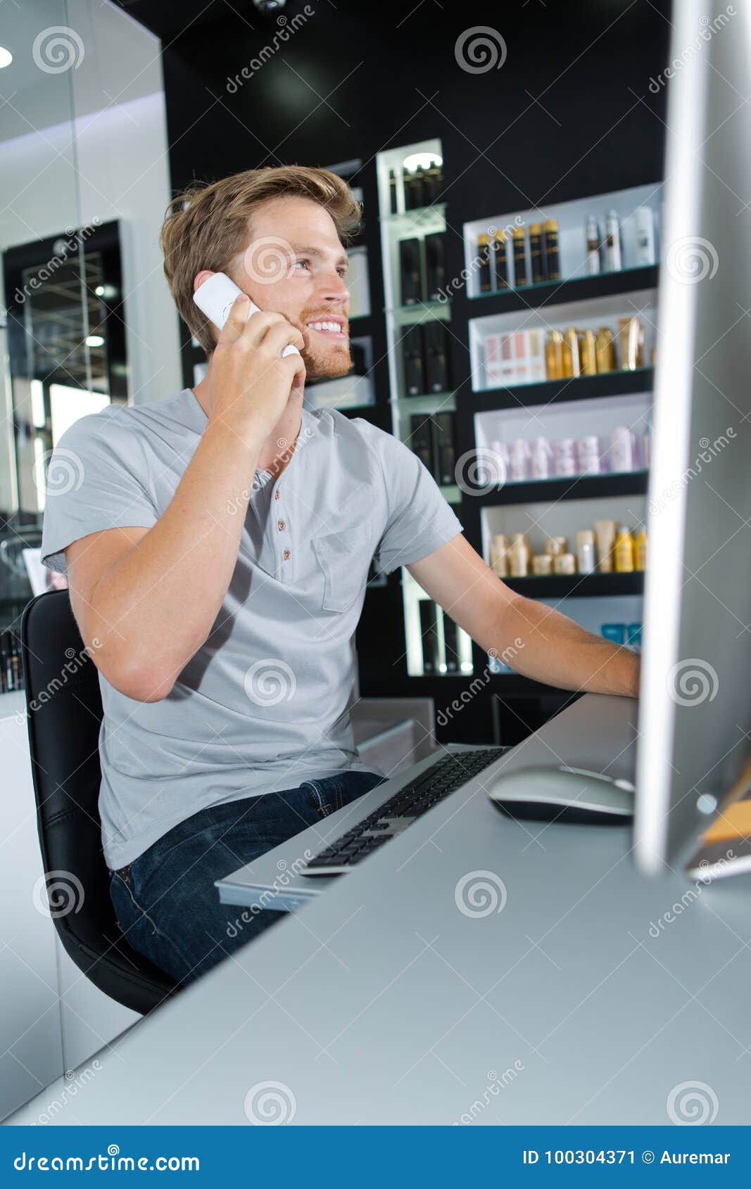 Man selling through phone stock image. Image of commercial - 100304371