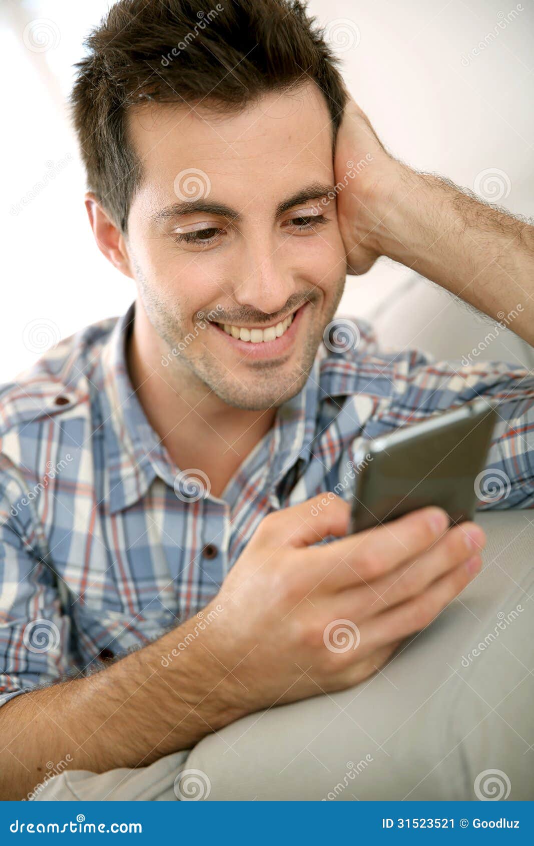 Man Sending Message on Smartphone from Home Stock Image - Image of ...