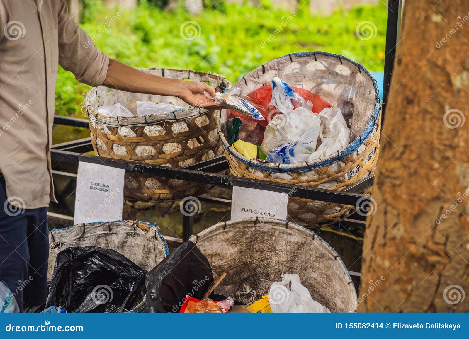 Man Separately Picks Up Trash. Separate Garbage Collection Concept ...
