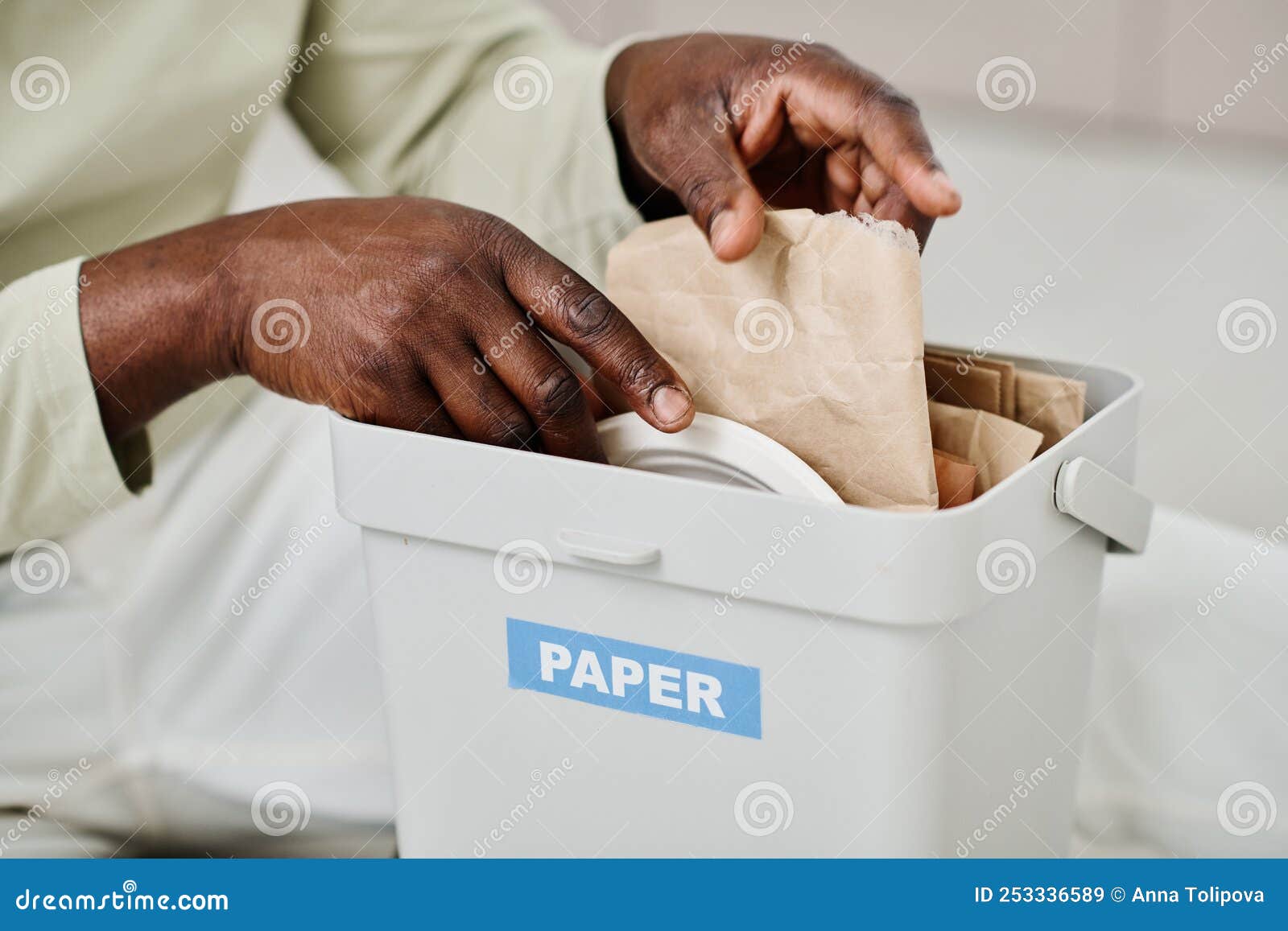 Man Separating Paper in Special Container Stock Image - Image of ...
