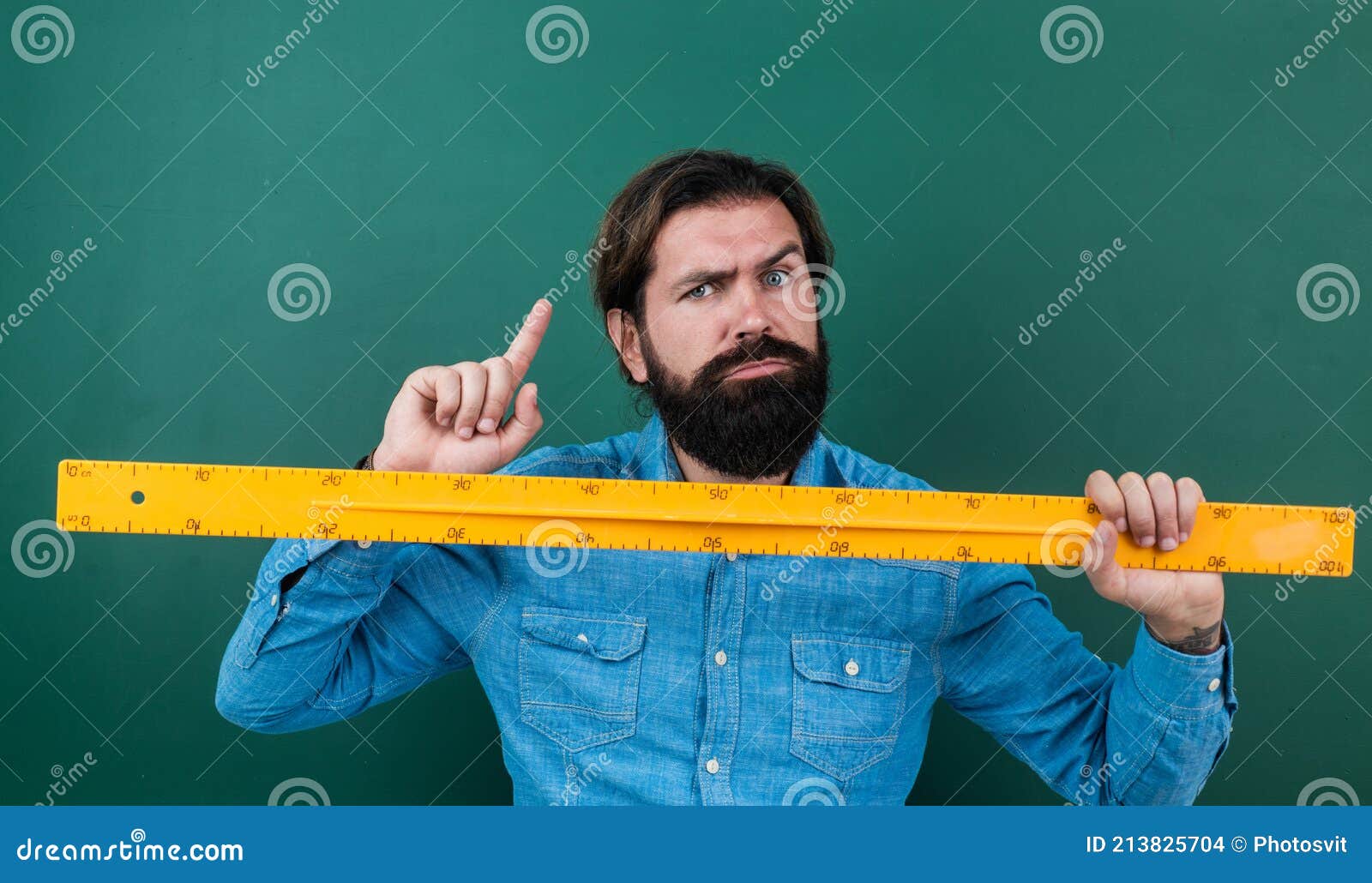 Man Serious with Size Measured on Ruler Math Tool, Inspired Teacher ...