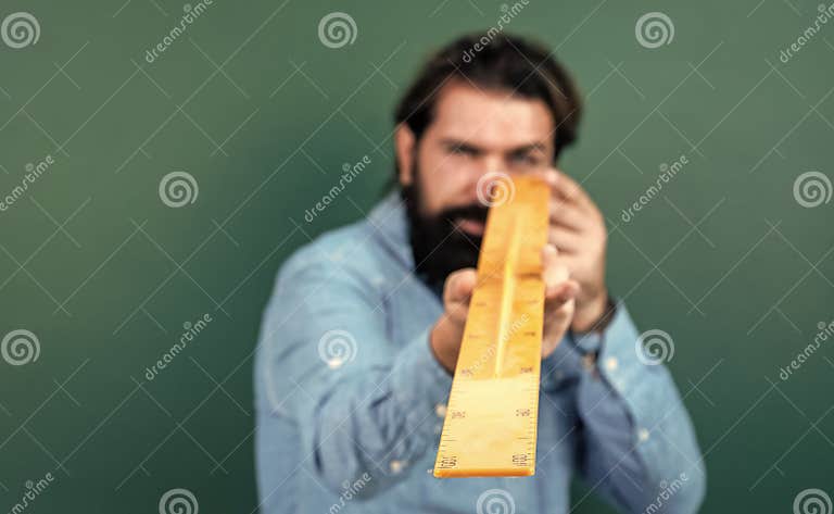 Man Serious with Size Measured on Ruler Math Tool, Size Concept ...
