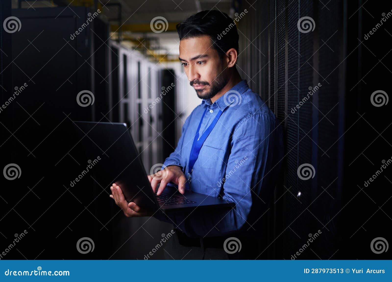 Man, Server Room and Laptop of Programming, System Management and Data ...