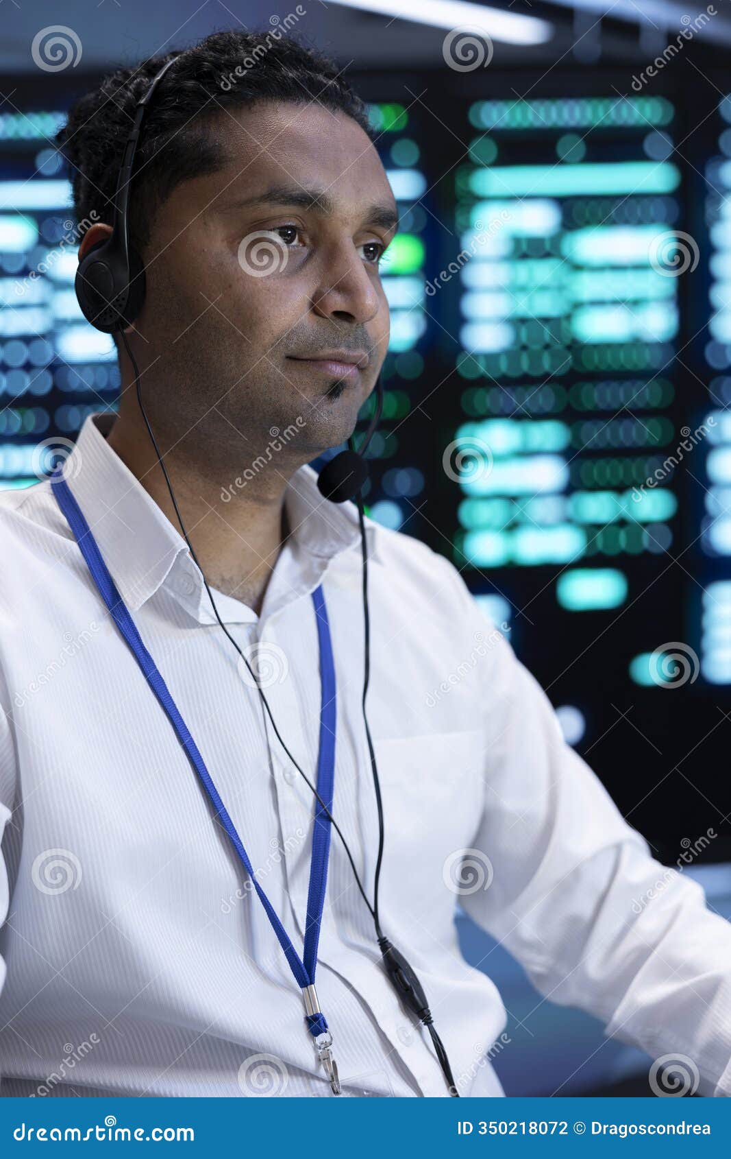 Man in Server Room Overseeing Infrastructure Systems Stock Photo ...