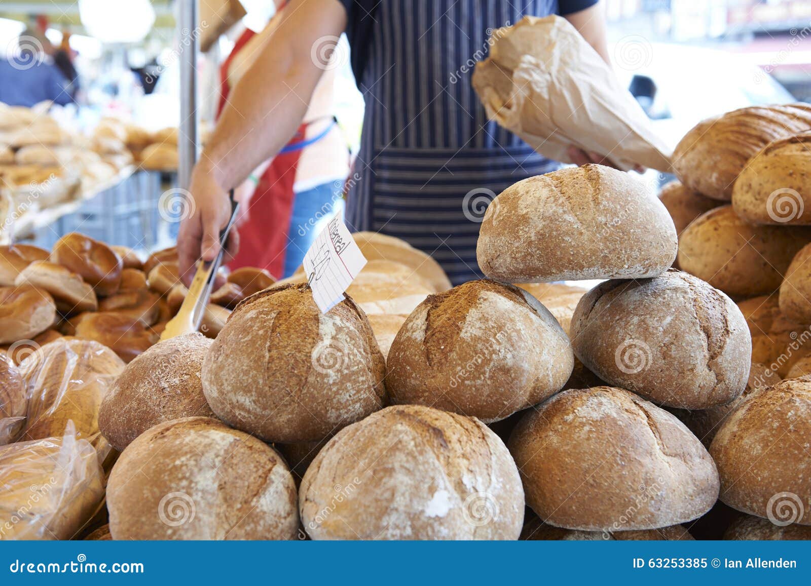 Man Serving on Bread Stall at Outdoor Market Stock Image - Image of ...