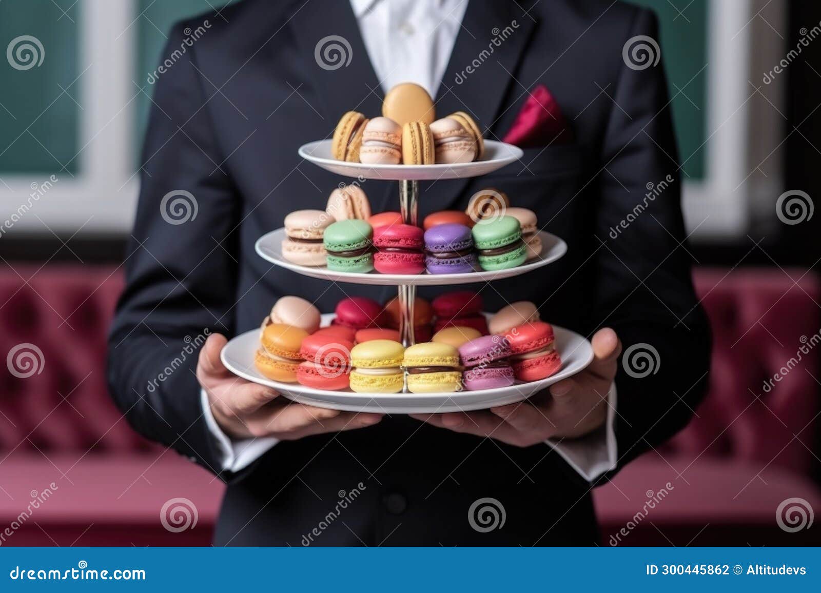 Man Serving Stacks of Macarons on Platter Stock Photo - Image of food ...