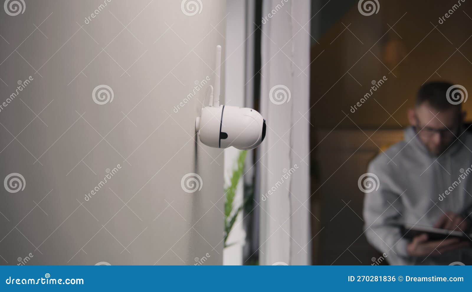 Man Sets Up Security Camera for Night Stock Photo - Image of night ...