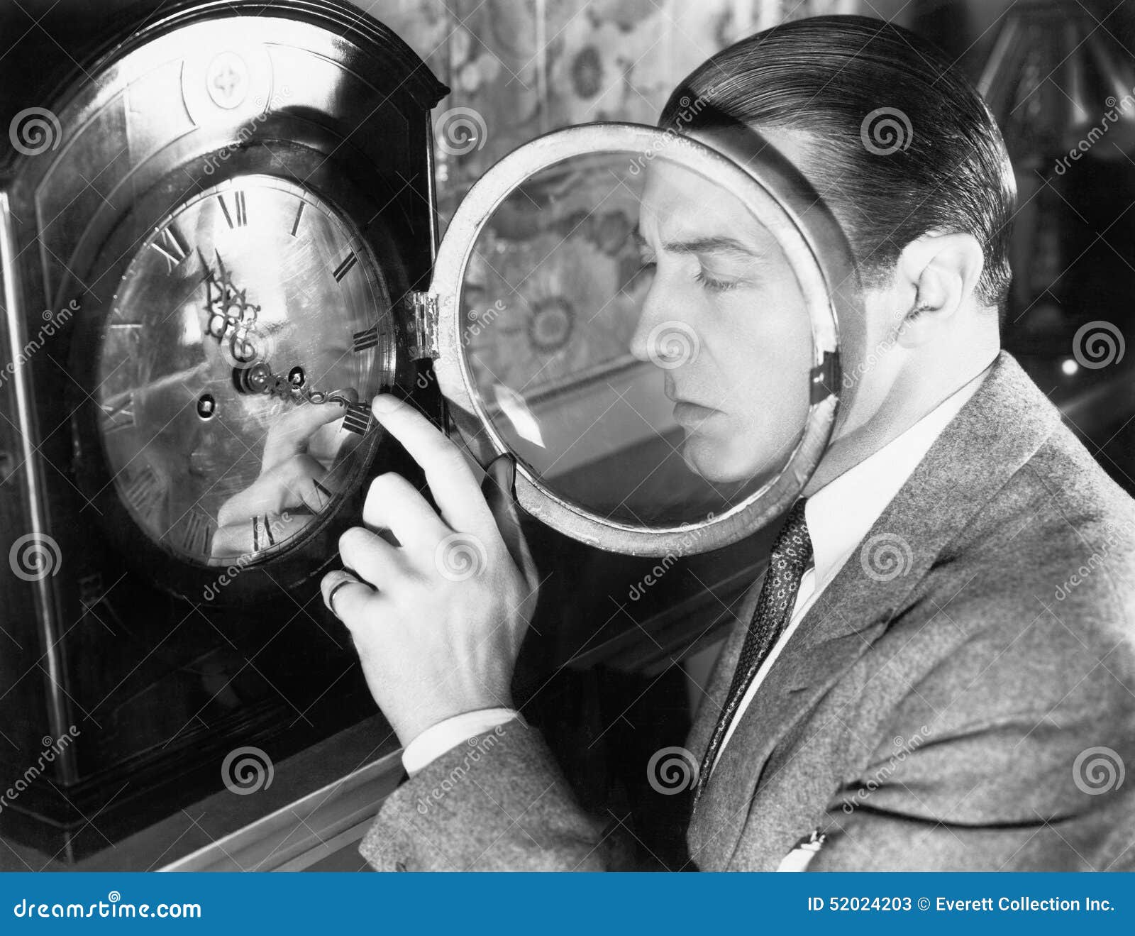 Man setting a clock stock image. Image of bygone, indoor - 52024203
