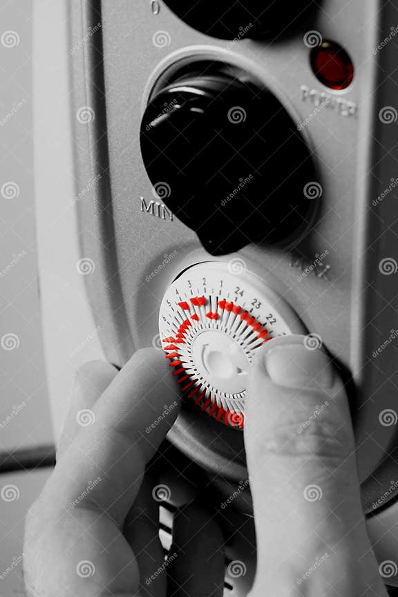 Man setting timer stock image. Image of home, heat, temperature - 94299965