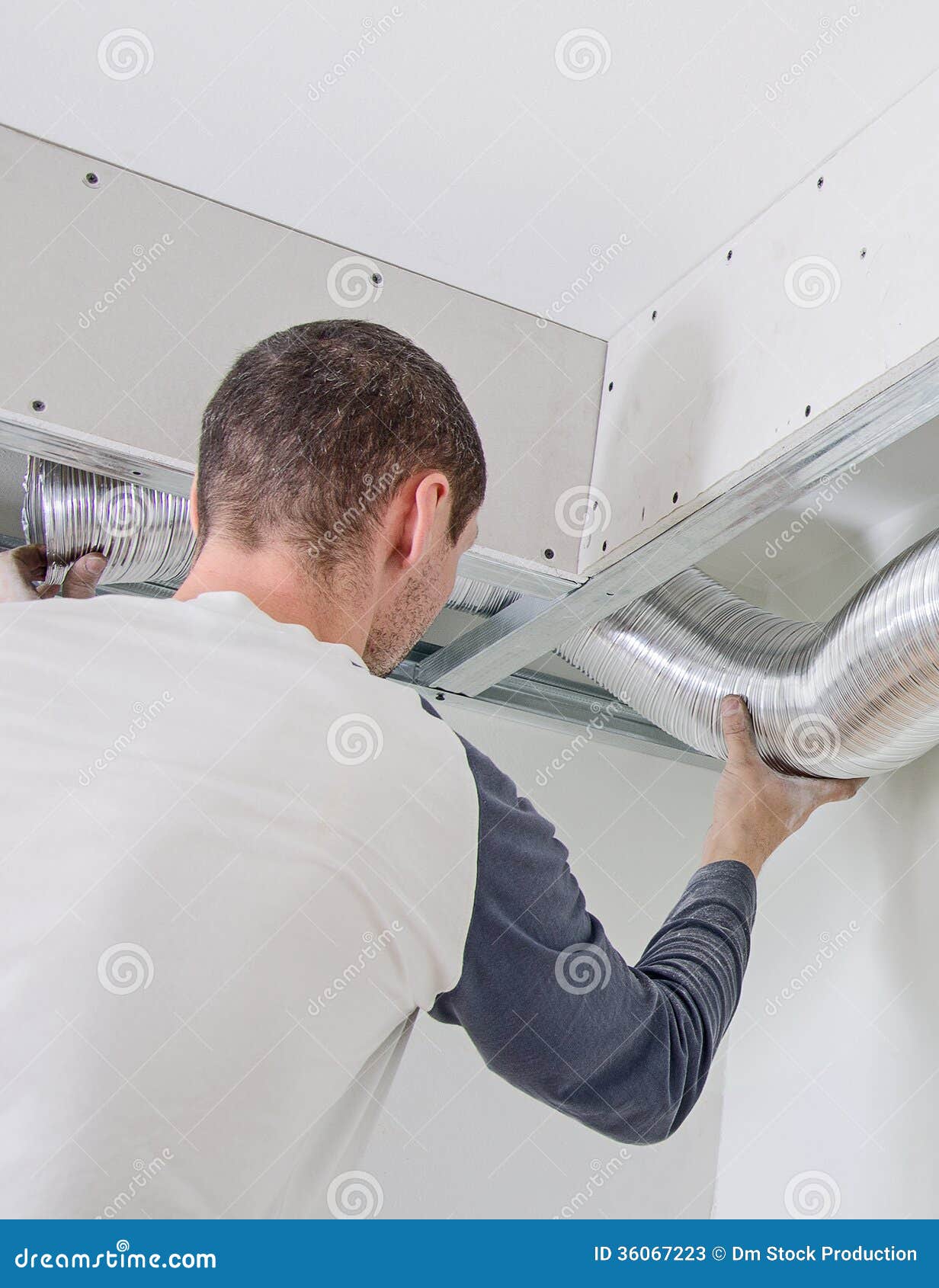 Man setting up ventilation stock image. Image of engineering - 36067223