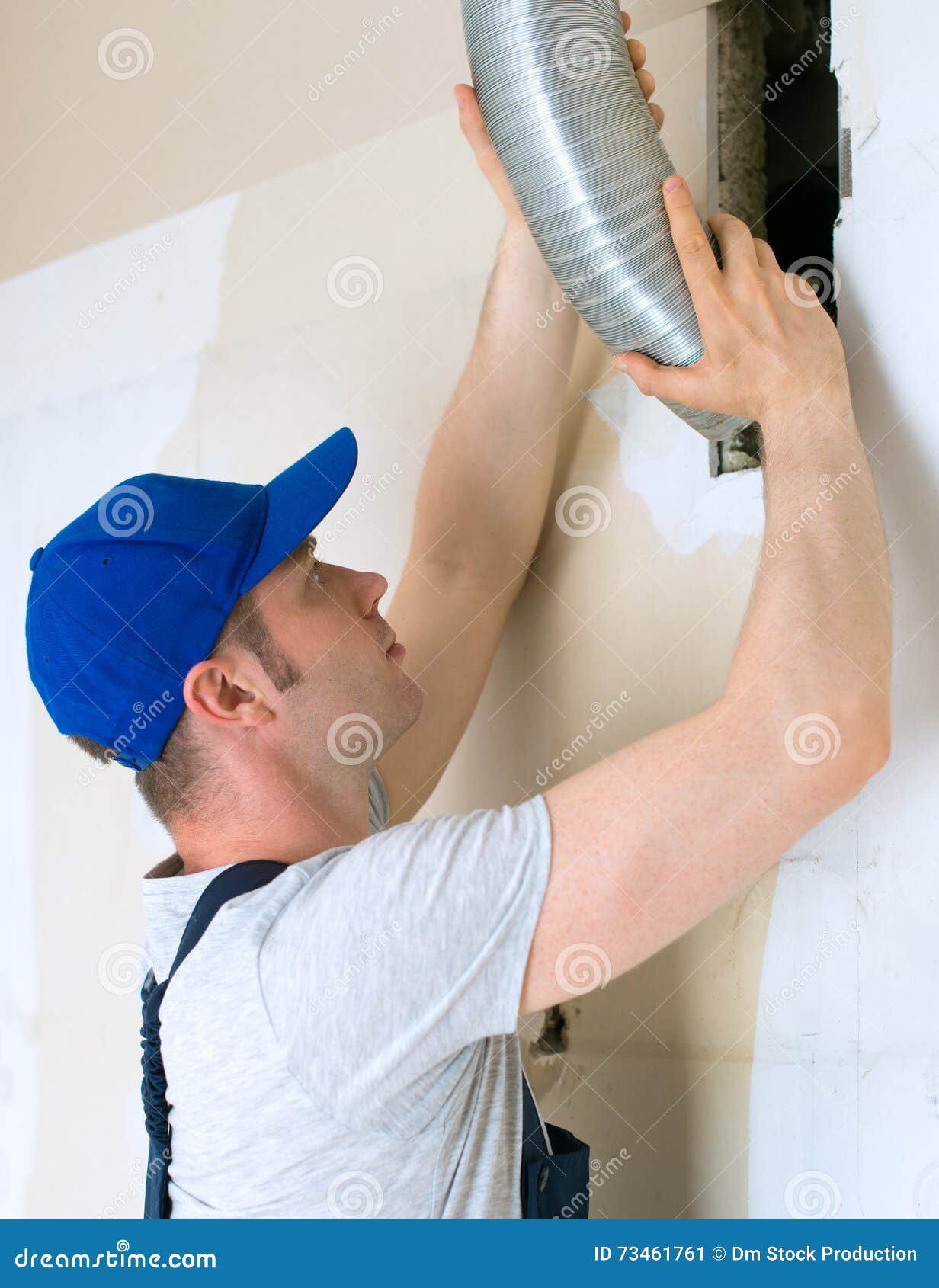 Man Setting Up Ventilation. Stock Image - Image of engineering, pipe ...