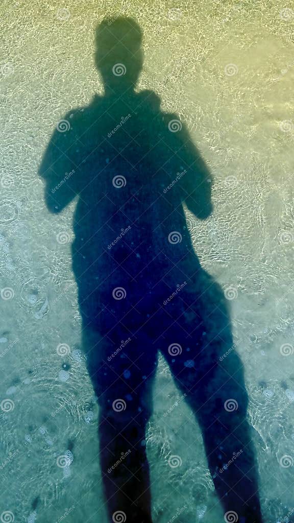 Man and Shadow Stand on Water Surface Stock Photo - Image of happy ...