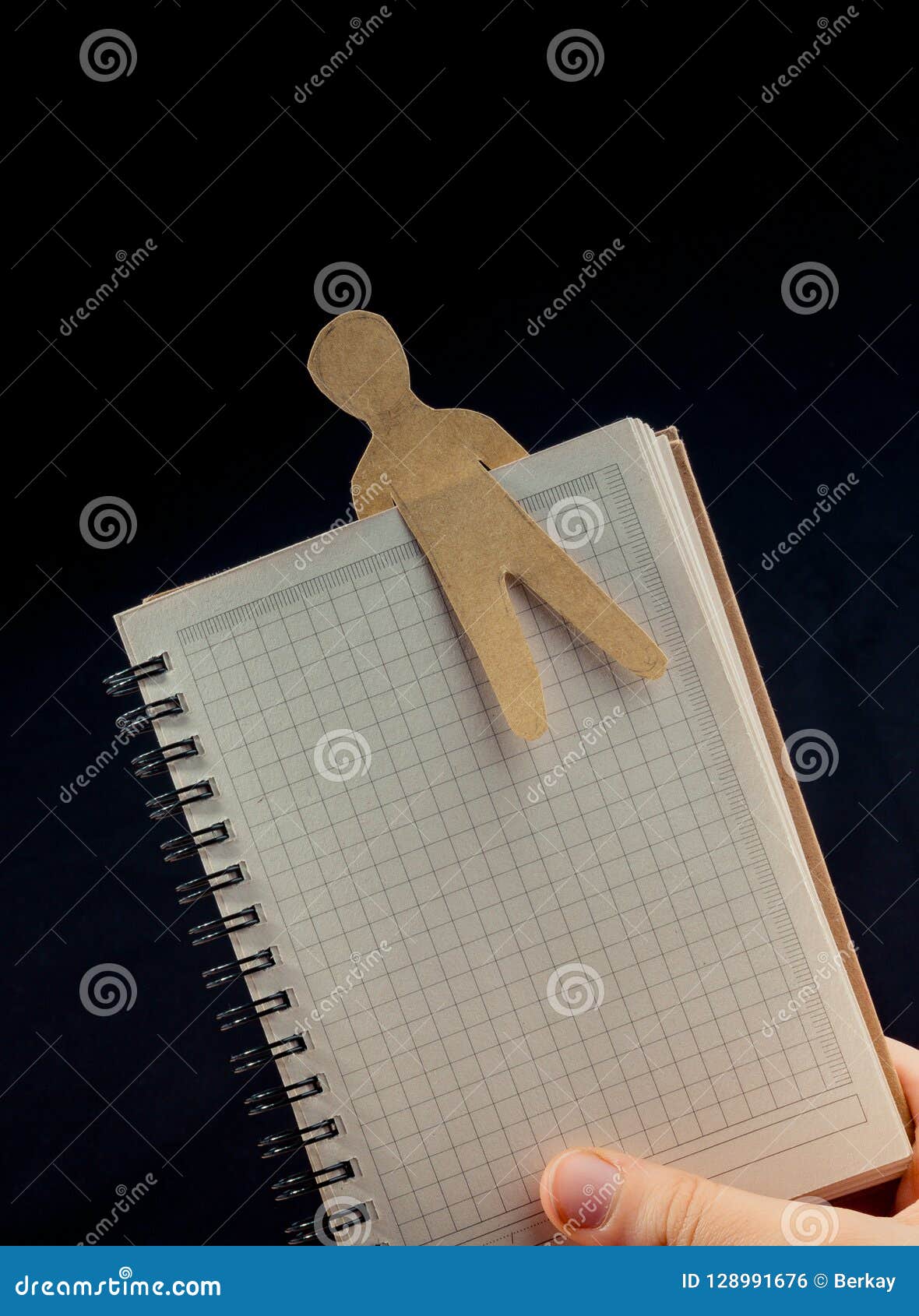 Man Shape Cut Out of Paper in Notebbok Stock Photo - Image of alphabet ...