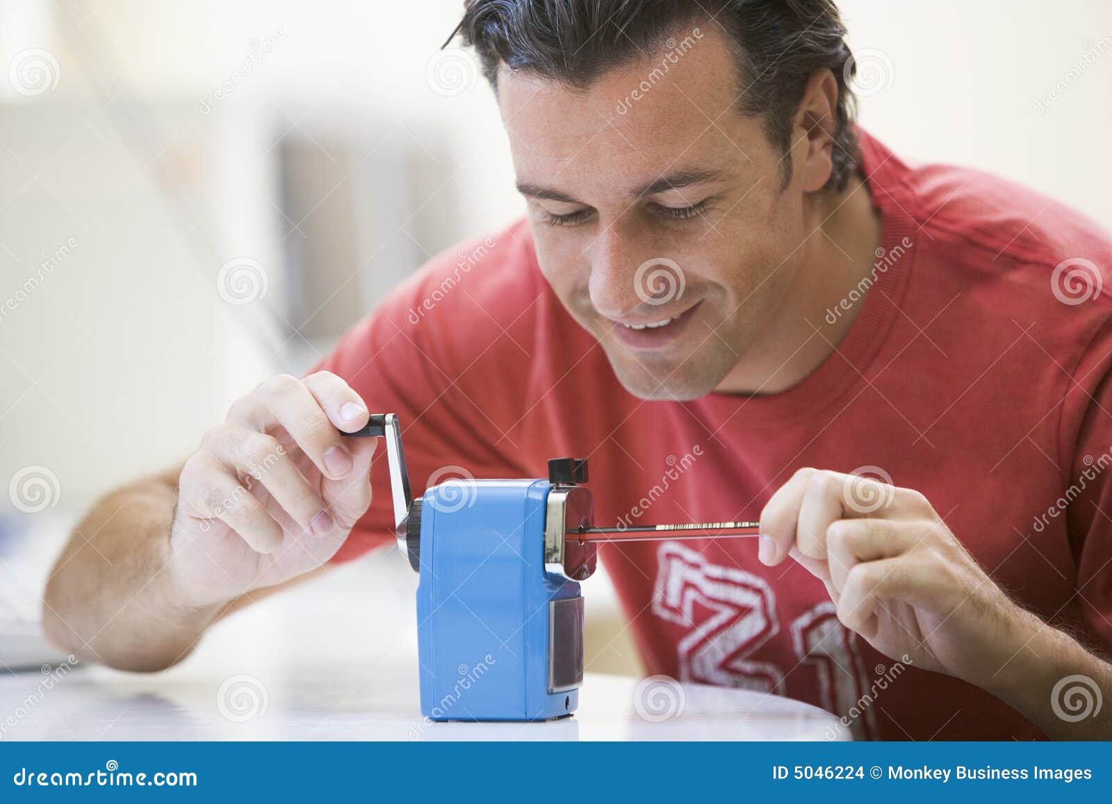 Man sharpening pencil stock photo. Image of caucasian - 5046224